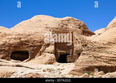 Majestic cliffs of the Grand Canyon illuminated by warm golden sunlight ...