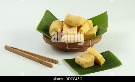 Tape Singkong or peyeum, a traditional Indonesian food, is made from ...
