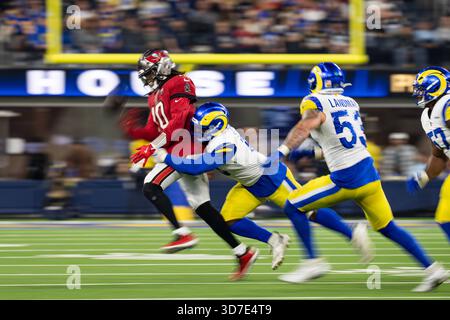 Los Angeles Rams linebacker Josaiah Stewart (10), defensive tackle ...