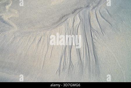 Patterns created by sea erosion on rocks at Rumbling Kern, near Howick ...