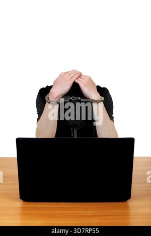Man in Handcuffs at the Desk with Laptop Isolated on the White ...