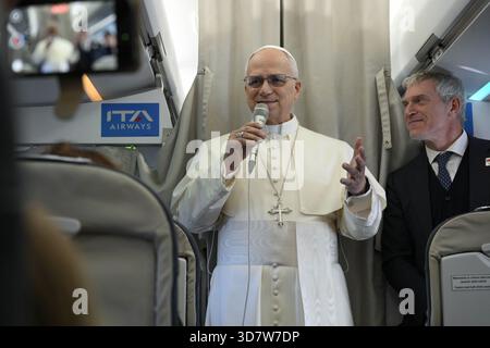 Pope Leo XIV talks to journalists as he leaves the Castel Gandolfo ...