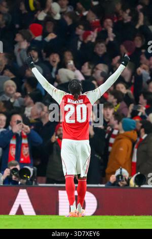 Arsenal forward Noni Madueke (20) applauds the fans during the Paris ...