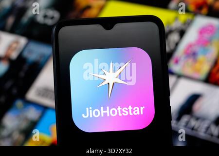 In this photo illustration, the JioHotstar (Jio Hotstar) logo is seen ...