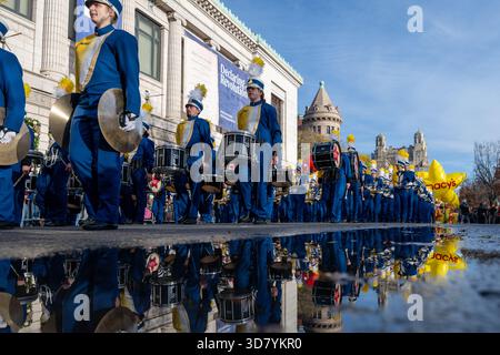 Performers march in the Macy's Thanksgiving Day Parade on November 27 ...