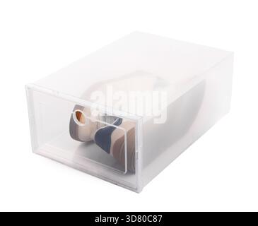 Pair of sneakers in plastic box on white background. Shoe storage Stock ...