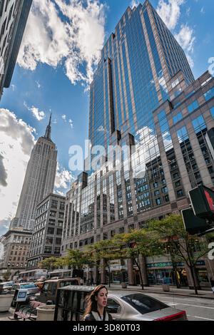 People walk on Fifth Avenue in Manhattan, New York City. (Photo by ...