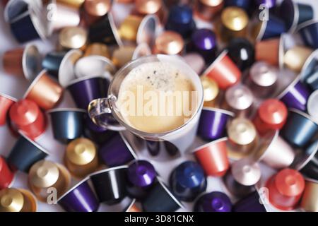 Capsule coffee machine and coffee capsules of different colors Stock ...
