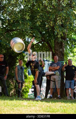Draft keg throwing contest at moto camp in Prnjavor during moto meet ...
