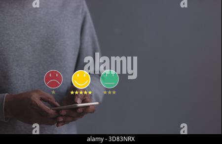 Customer Review, Young Man hand holding Smart Phone with five star to ...