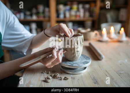 Craftsman moulding a piece of pottery on an Arab potter's wheel Stock ...
