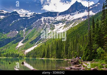 The beautiful Avalanche lake shore in Glacier National Park with ...