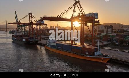 FUZHOU, CHINA - NOVEMBER 29, 2025 - The cargo ship is loading and ...