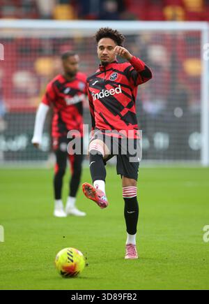 Brentford's Kevin Schade warming up prior to kick-off before the ...