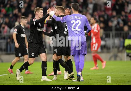from left: Eric Smith, Karol Mets (St. Pauli) Wolfsburg, January 14 ...