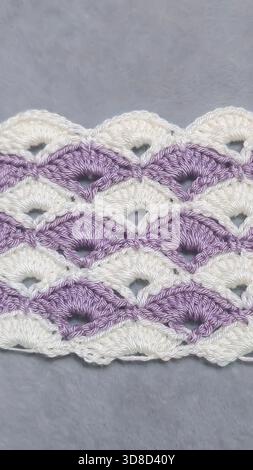 colored yarn for knitting on a light background Stock Photo - Alamy
