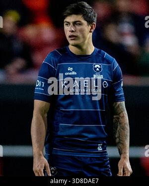 Bristol Bears' Louis Rees-Zammit is tackled by Harlequins' Marcus Smith ...