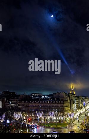 Paris, France; December 28 2025: Female vendor at a traditional ...
