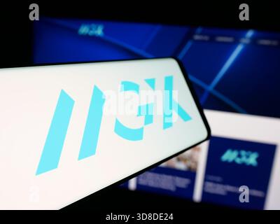 In this photo illustration, the logo of Emirati International Holding ...