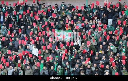 Fans hold protest cards up during the Premier League match between West ...