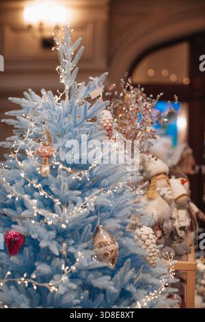 Christmas tree with blue and silver toys. Festively decorated Christmas ...
