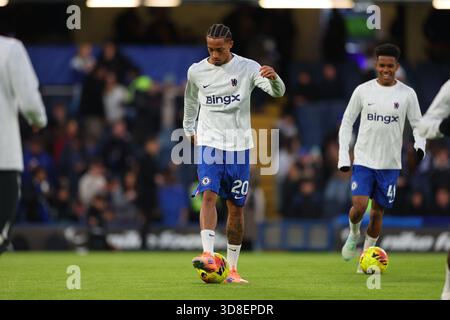 Joao Pedro of Chelsea warming up ahead of the Premier League match ...