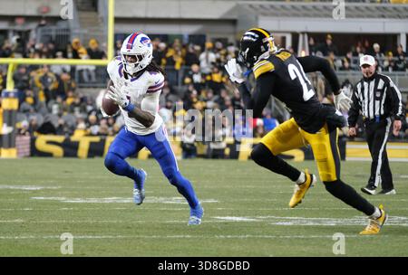 Buffalo Bills' James Cook III runs against the New England Patriots ...