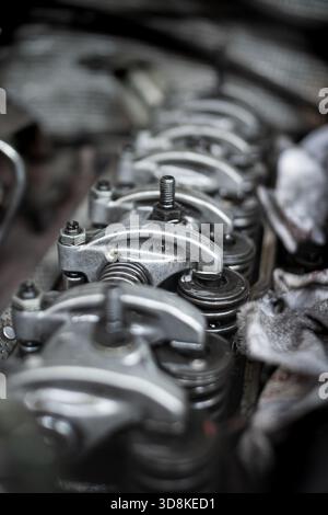 Vehicle overhead camshaft engine exposed for repair and maintenance ...