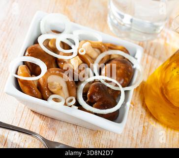 Pickled mushrooms shiitake with onions closeup Stock Photo - Alamy