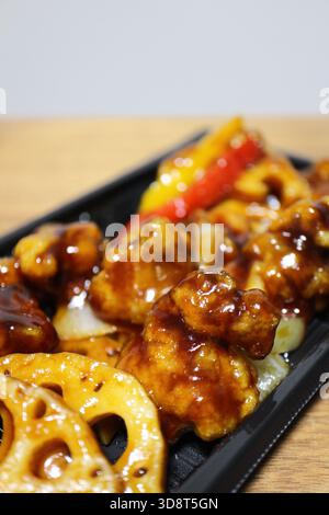 Black vinegar subuta (sweet and sour pork) purchased at a supermarket ...