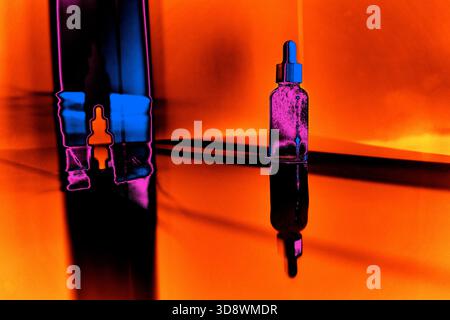Glowing cosmetic bottle with dropper and gel texture on clean surface ...