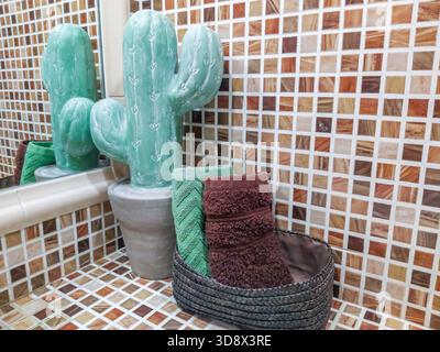 Bathroom Counter Organization with Woven Basket. Hairdryer, towel ...