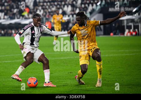 Jonathan David of Juventus FC competes for the ball with Mohamed Kaba ...
