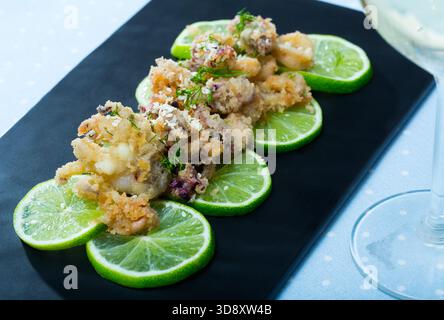 Fried calamari and sepia in a batter of tempera flour and glass of wine ...