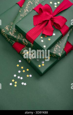 Heap of golden confetti on red background Stock Photo - Alamy