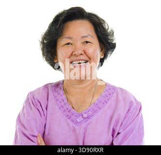 Studio shot of cheerful senior Chinese couple Stock Photo - Alamy
