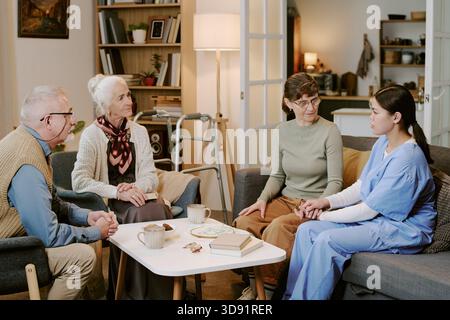 Middle age senior hispanic woman over isolated background with a big ...