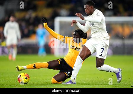 Wolverhampton Wanderers' Mateus Mane (left) with manager Rob Edwards ...