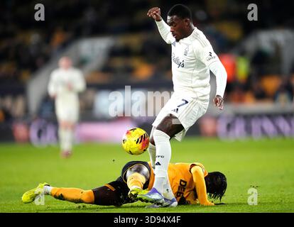 Wolverhampton Wanderers' Mateus Mane (left) with manager Rob Edwards ...