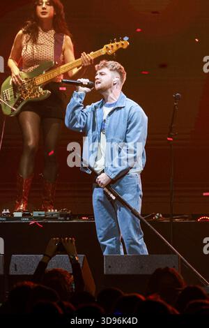 Alex Warren performs during iHeartRadio 106.1 KISS FM's Jingle Ball ...