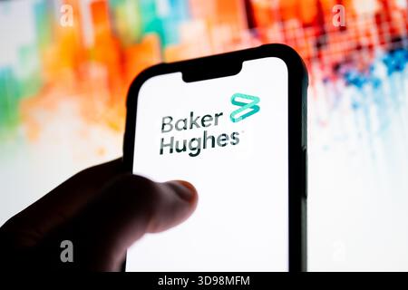 In this photo illustration the Baker Hughes Company logo seen displayed ...