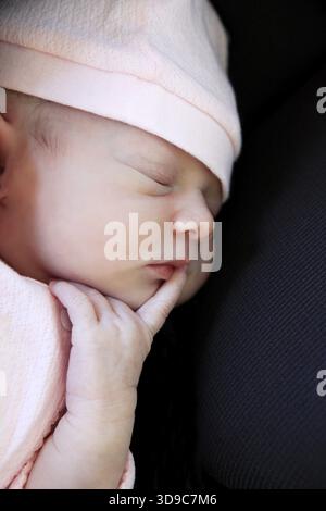 Newborn baby in the first days of life. Cute little newborn baby Stock ...