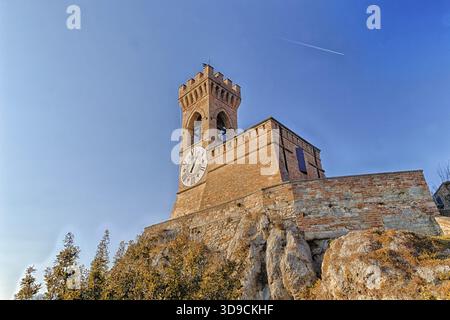 Medieval crenellated brick wall Clock tower Stock Photo - Alamy
