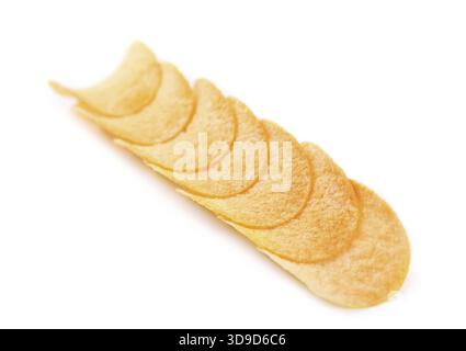 Row potato chips. Photographed on a white background Stock Photo - Alamy