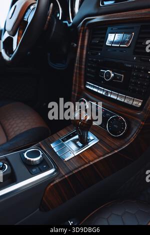 Modern car interior details. Car wooden panel. Interior of prestige ...