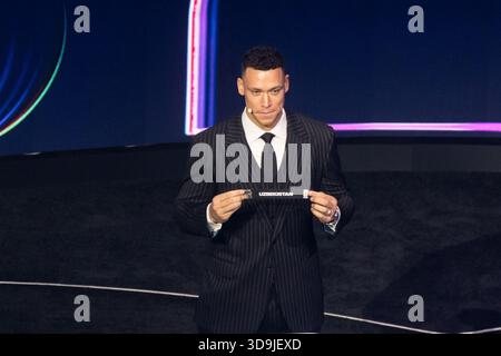 Aaron Judge assists during the 2026 FIFA World Cup draw at the John F ...
