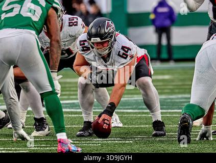 Atlanta Falcons center Ryan Neuzil (64) prepares to snap the ball to ...