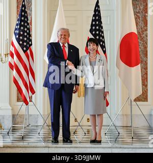 Japanese Prime Minister Sanae Takaichi heads to attend a House of ...