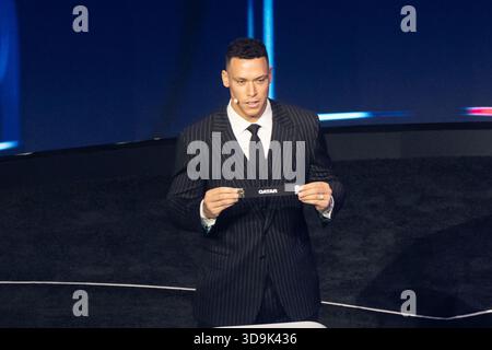Aaron Judge assists during the 2026 FIFA World Cup draw at the John F ...