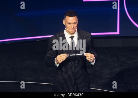 Aaron Judge assists during the 2026 FIFA World Cup draw at the John F ...